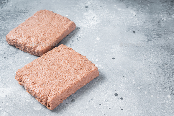 Raw plant based meat, food reduce carbon footprint. Gray background ...