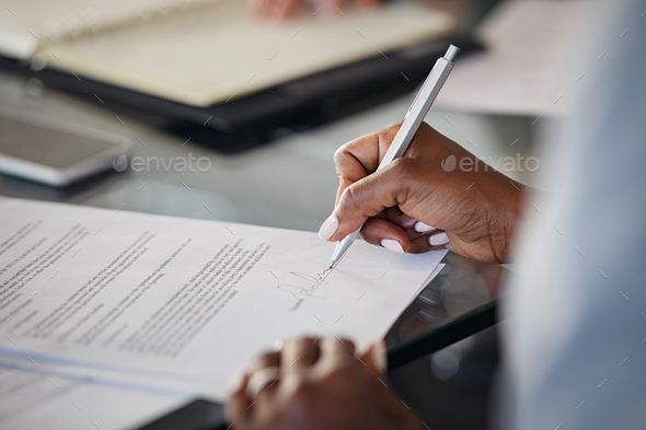 Close up of black businesswoman hand signing contract at office Stock ...
