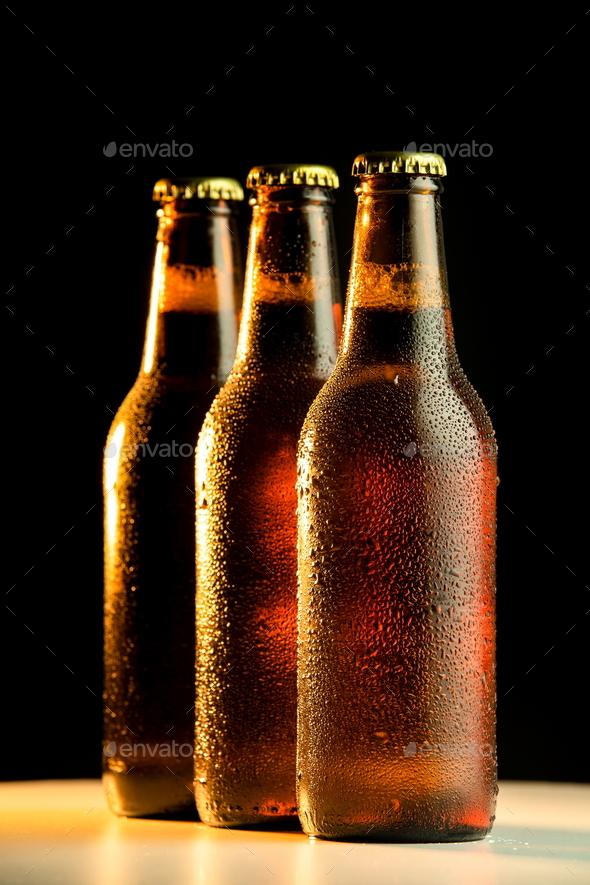 Ice cold beers with black background Stock Photo by EnriqueMicaelo