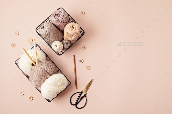 Craft hobby background with yarn in natural colors Stock Photo by OksaLy