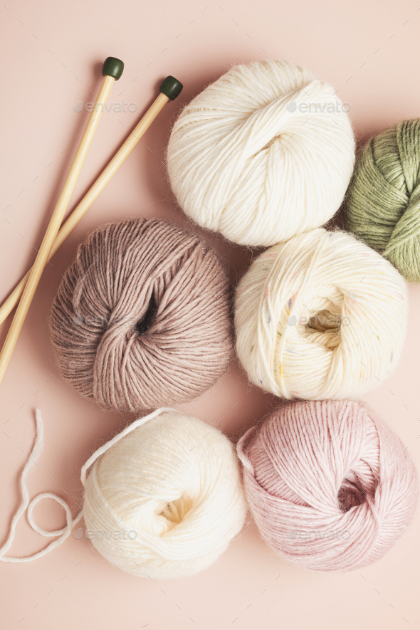 Craft hobby background with yarn in natural colors Stock Photo by OksaLy