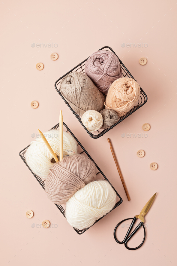 Craft hobby background with yarn in natural colors Stock Photo by OksaLy