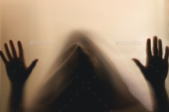 Shadowy figure behind glass - horror background Stock Photo by erika8213