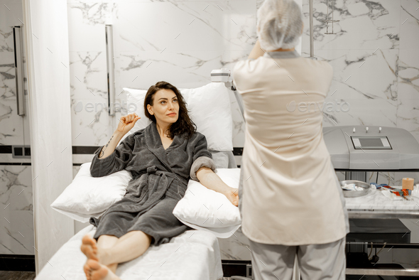 Woman during blood washing procedure at medical centre Stock Photo by ...