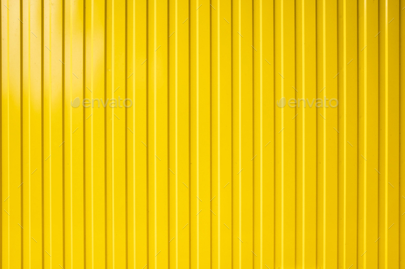 Yellow metal fence. Bright textured background. Copy space. Stock Photo ...