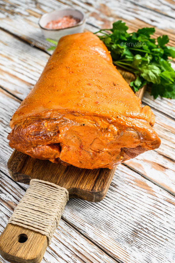 Raw fat pork knee ready for cooking. White background. Top view Stock ...