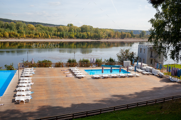 Blue pool without people on the riverbank in autumn. Stock Photo by ...