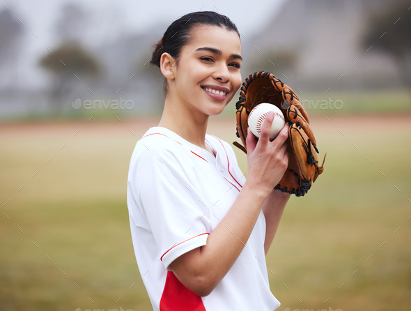 Ready. Cropped portrait of an attractive young female baseball player ...
