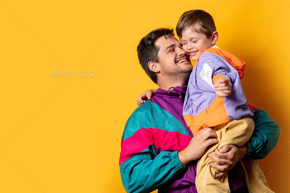 Father with son in 80s vintage sport suits Stock Photo by Masson-Simon