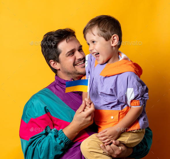 Father with son in 80s vintage sport suits Stock Photo by Masson-Simon