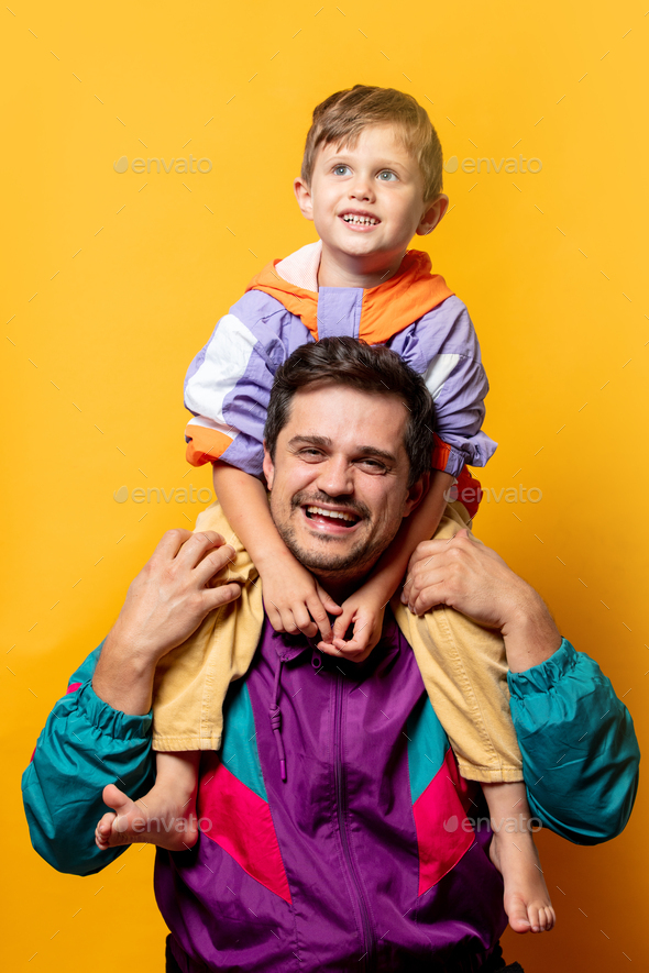 Father with son in 80s vintage sport suits Stock Photo by Masson-Simon