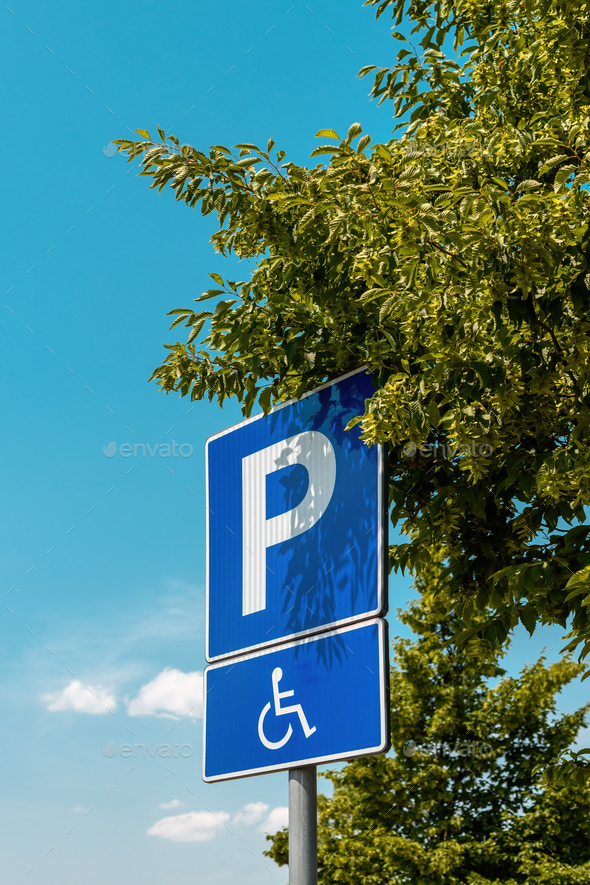 Reserved parking space sign, handicapped person with disability in ...