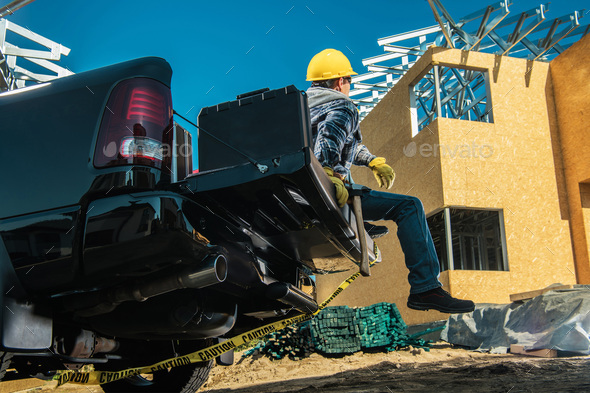 Construction Worker Taking a Break During Work Stock Photo by duallogic