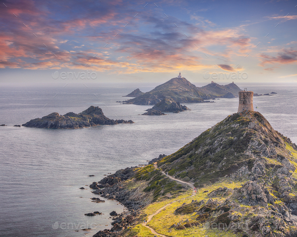 Sunset over popular tourist destination Torra di a Parata with Genoese ...