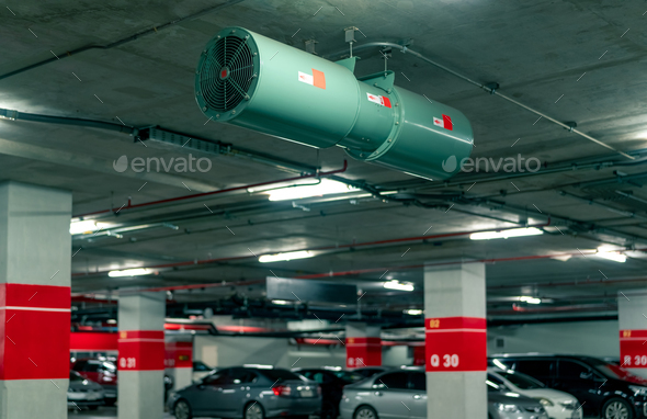 Jet fan at underground parking area. Ventilation fan in the parking lot ...