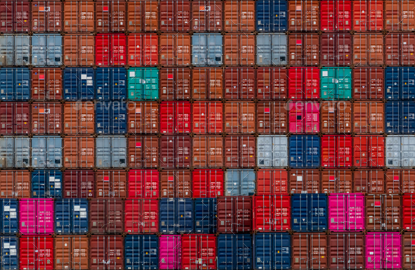 Stack of logistics container. Cargo and shipping business. Container ...
