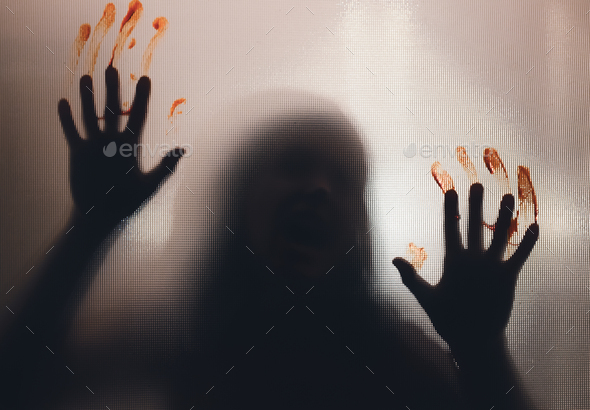 Shadowy figure with blood behind glass - horror background Stock Photo ...