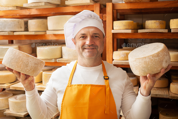 male, man cheese maker businessman, individual entrepreneur, checks ...