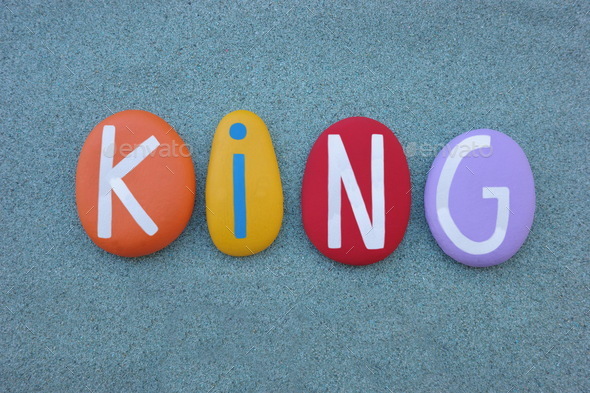 King, male sovereign or monarch text composed with multi colored stone ...