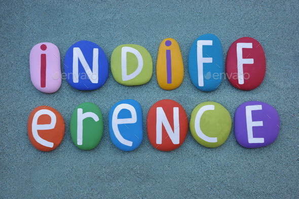 Indifference word composed with multi colored stone letters over green ...