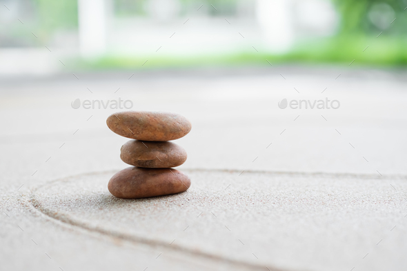 Japanese Zen Garden with Pebble with Line on Sand Stock Photo by wing-wing