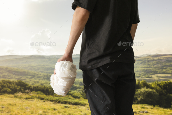 the environmental problem, volunteer holding a plastic garbage, stop ...