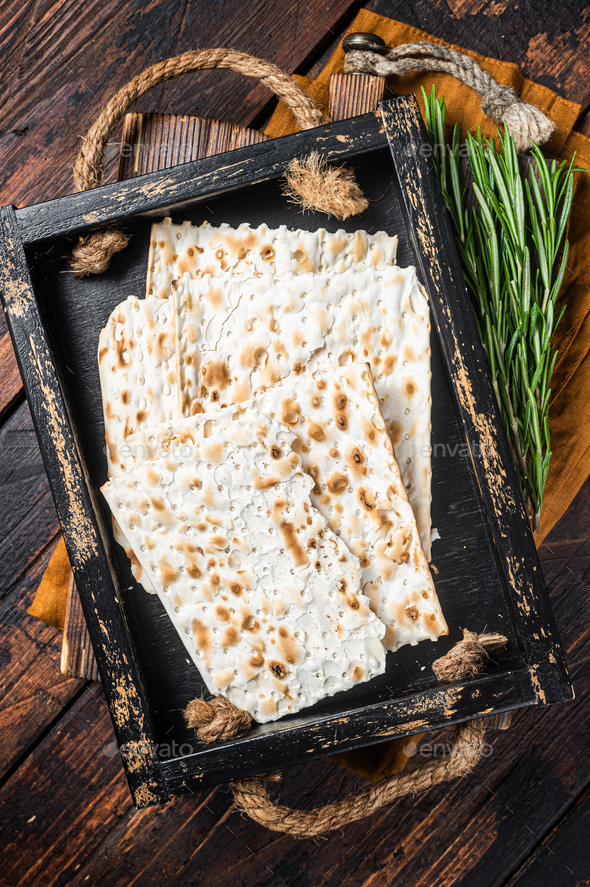 Passover matzos of celebration with matzo unleavened bread in a wooden ...