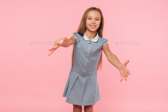 Cheerful young preteen teenage caucasian schoolgirl hugging embracing ...