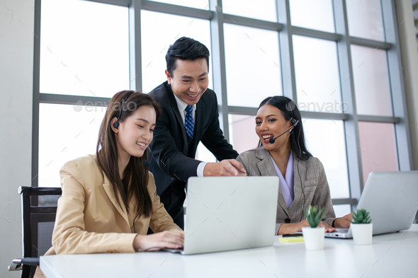 Supervisors teach work to employees in the office, Business concept ...