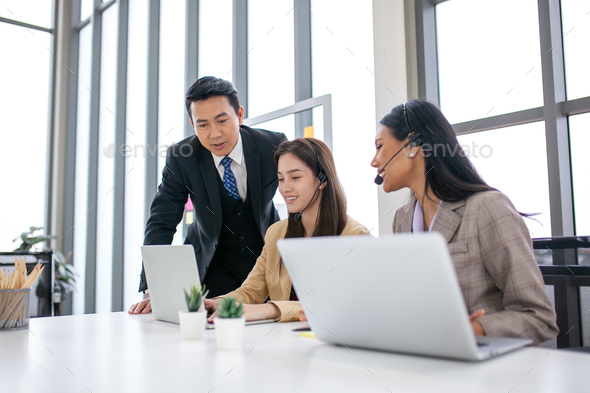 Supervisors teach work to employees in the office, Business concept ...