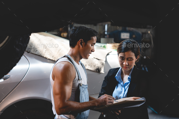 customer making inspection check to a car engine repair occupation job ...