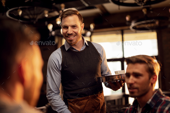 Welcome, how can I be at your service today? Stock Photo by drazenphoto