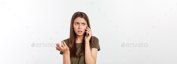 Worried young woman looks nervously, Female is nervous while talking on ...