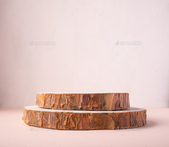 Wooden eco rustic pine tree wood circle disc platform podium on beige ...
