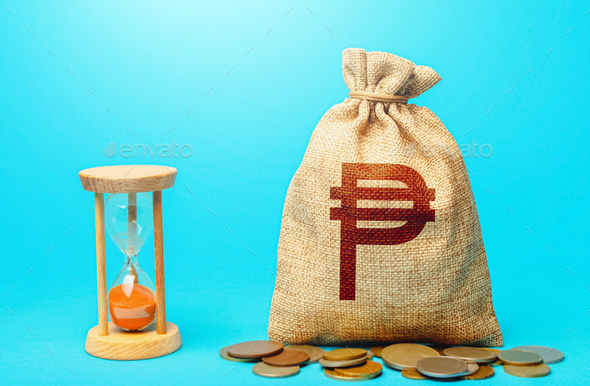 Philippine peso money bag and hourglass. Placing a deposit in the bank ...