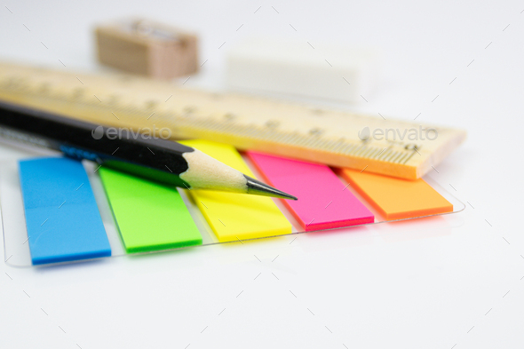 close up a pencil with paper color note on white background Stock Photo ...