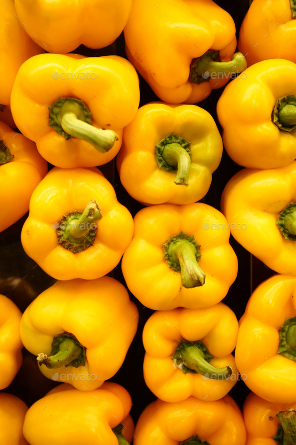 stack of yellow capsicum background Stock Photo by towfiqu98 | PhotoDune