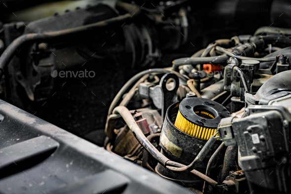 View of engine and other parts under the open hood of a car Stock Photo ...