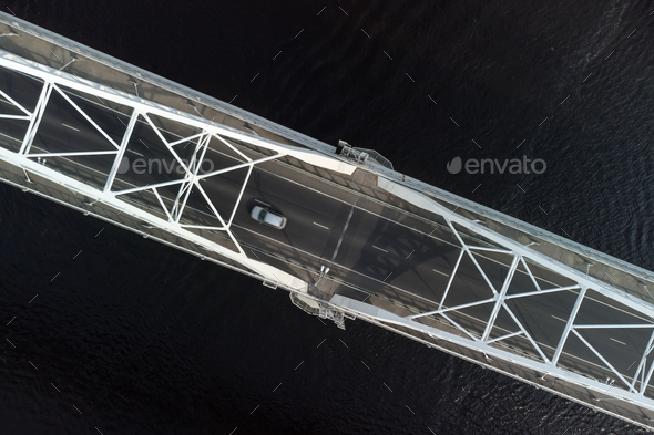 Road bridge over the river, filmed on a copter. Stock Photo by ktkbr-lew
