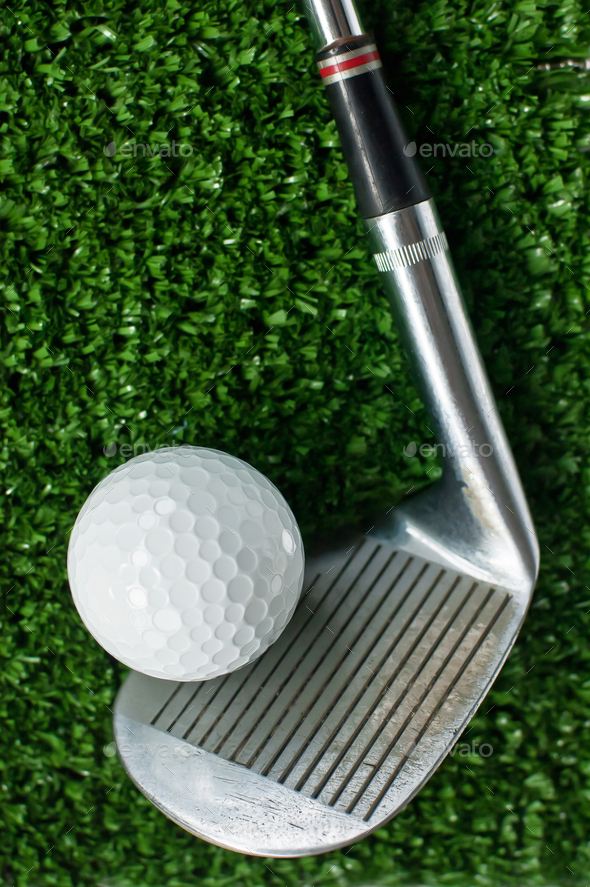Golf ball and putter Stock Photo by osbmxhouse | PhotoDune