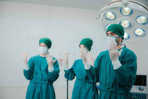 surgical doctor wearing protected medical operation uniform suit ...