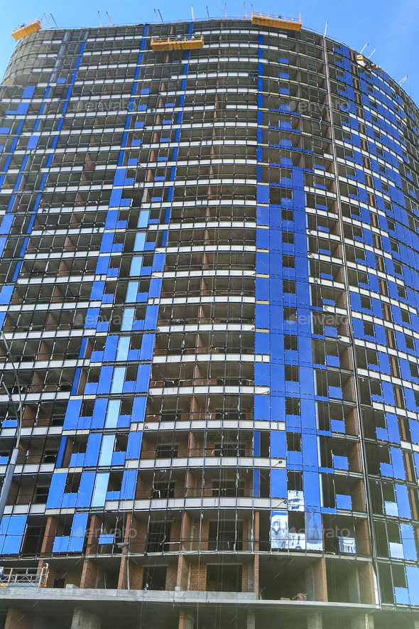 Facade of typical high rise apartment building with balcony and windows ...
