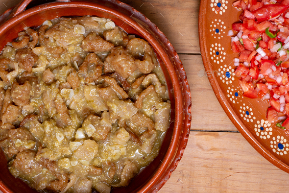 Chicharrones in green sauce, typical Mexican food. Stock Photo by ...