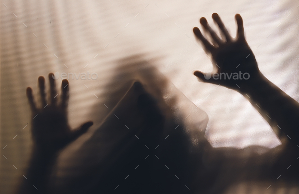 Shadowy figure behind glass - horror background Stock Photo by erika8213