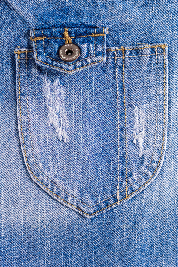 Torn jeans pocket denim background texture. Blue jeans fabric as ...