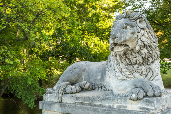 View of lion statute at Laxenburg castles park in the evenin Stock ...