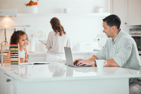 Shot of a young father working from home while his daughter does ...