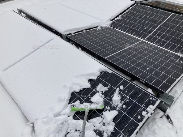 clear solar panels with wiper of snow Stock Photo by fredlackner ...