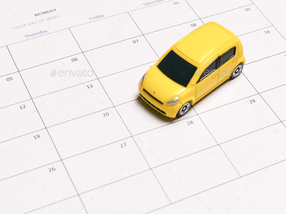 Miniature car on blank calender. Stock Photo by Ekahardiwito | PhotoDune