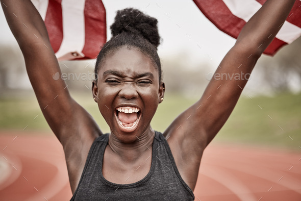 Shot of a young female athlete celebrating her win while running with a ...
